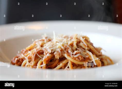 Spaghetti Bolognese With Minced Beef And Tomato Sauce Garnished With