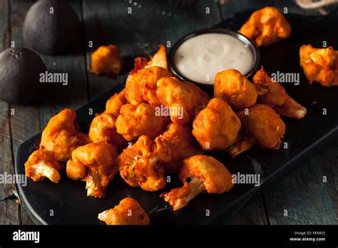 Spicy Breaded Buffalo Chicken Cauliflower With Blue Cheese Sauce Stock
