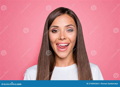 Close Up Portrait Of Young Attractive Woman With Long Brunette Hair Seductively Licking Her Lips