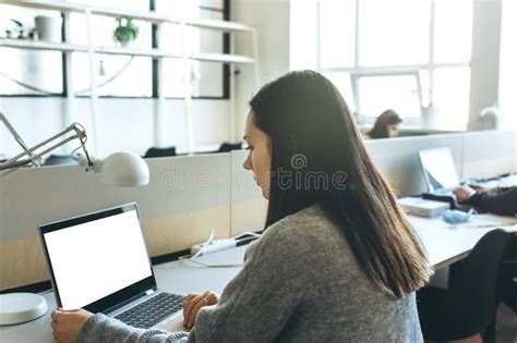 An Adult Girl Uses A Laptop With A Blank White Screen For Mockup Stock Image Image Of Female