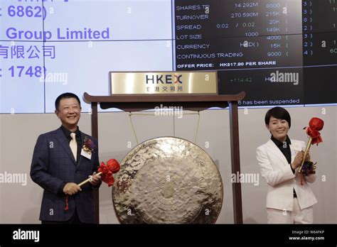 Zhang Yong Left Founder And Ceo Of Haidilao International Holding Ltd Poses During The