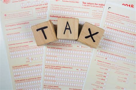 Premium Photo Word Tax On Cubes Australian Tax Forms