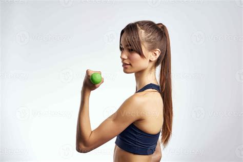 Athletic Brunette With Dumbbells In Hands Workout Cropped View Fitness