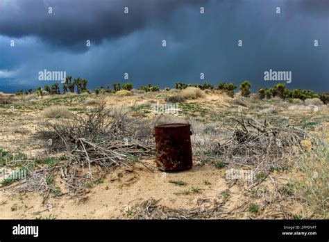A Rusty Tin Can In The Middle Of A Deserted Field Used For Target