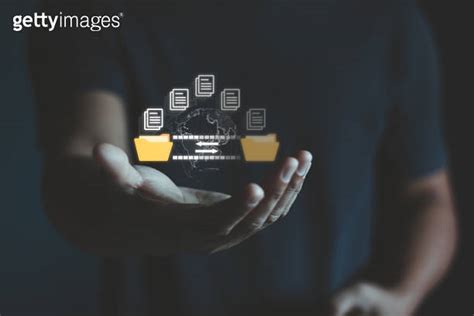 Man Hand Transferring Files In Virtual Screen For Send Of Document On Internet Data Transfer