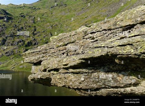 Rock Outcrop Small Water With Nan Bield Pass Above Mardale Head Haweswater Lake District