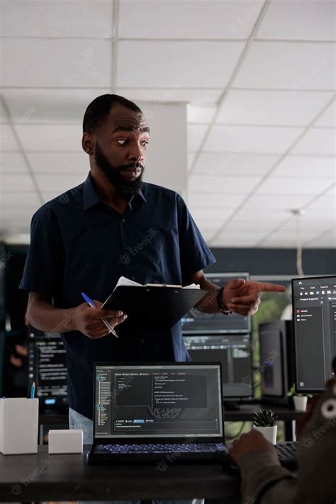 premium photo african american web developer analyzing html script on