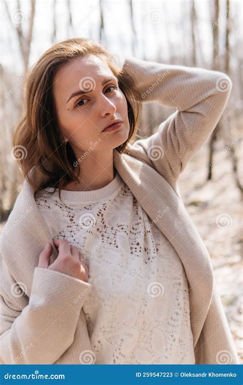Beautiful Girl In A White Dress And A Beige Coat In A Spring Birch Grove Stock Image Image Of