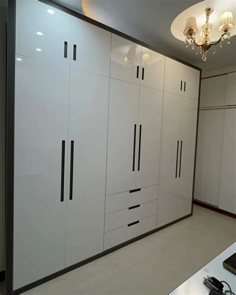 ‎کمد دیواری تخت کمجا کابینت‎ ‎زیبایی، نظم و کارایی را با یک کمد