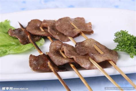 烤牛舌摄影图 传统美食 餐饮美食 摄影图库 昵图网