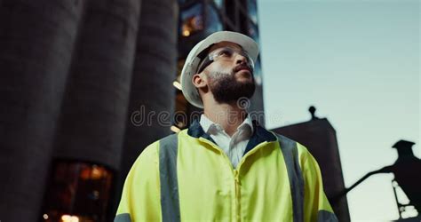 Engineer Man And Thinking Outdoor In Town At Night With A Solution