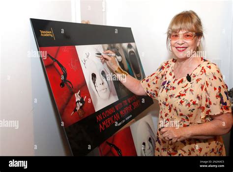Executive Producer Jennifer Salt Signs The Event Poster Backstage For