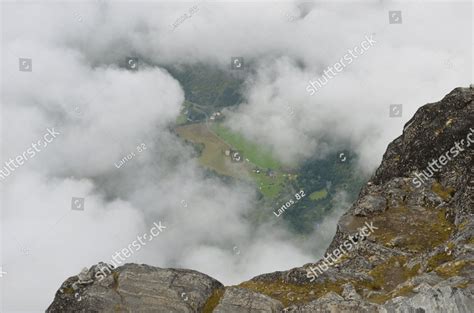 High Mountains Hidden In Dense Clouds Rocky Slopes Drowning In Clouds Or Thick Fog Misty