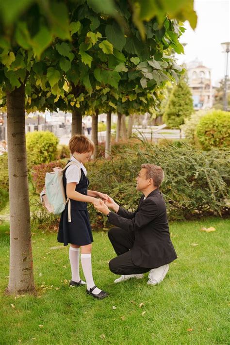 Dad And Babe In Babe Uniform On The Lawn Under A Tree Stock Image Image Of Babe