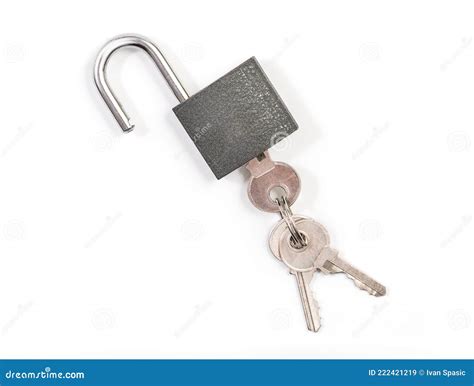 Lock And Keys Closeup Of A Old Opened Brass Padlock With Key Inside