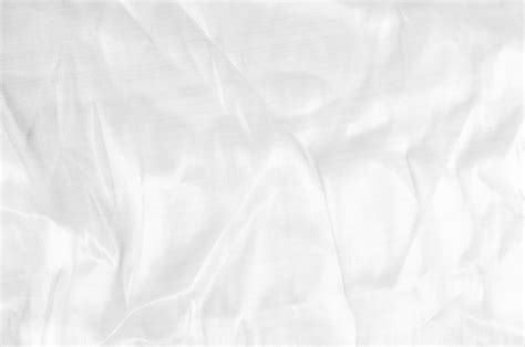 배경 질감 패턴입니다 직물은 흰색입니다 우아하고 섬세 한 화이트 실크 직물 배경입니다 밝은 공단 직물 배경으로 사용 하기 위해 접혀 직물 섬유 표면의 위 유형입니다 0명에