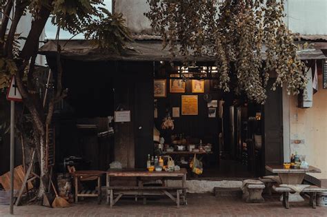 Premium Photo Chairs And Tables Against Building
