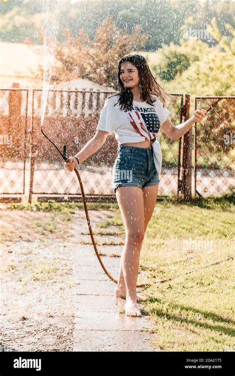 Girl With A Fountain In The Garden At Sunset Hot Summer Wet Shirt