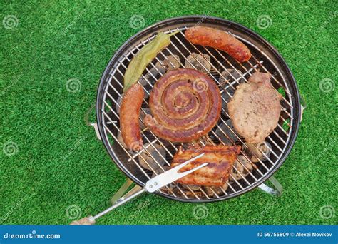Assorted Meet Products On Hot Bbq Grill High Angle View Stock Image