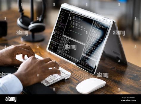 African American Coder Using Computer At Desk Web Developer Stock