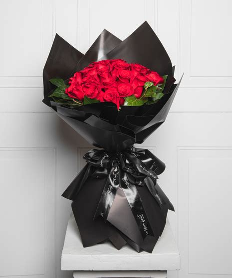 Two Dozen Wrapped Roses Orlando Fl Same Day Flower Delivery In