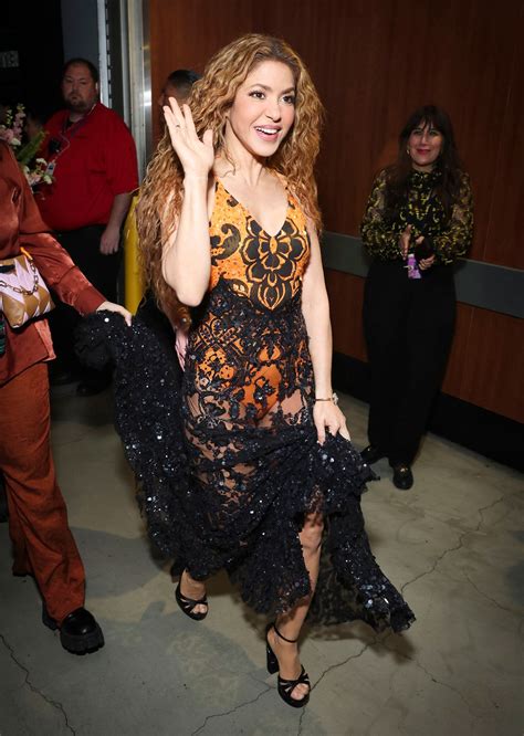 Shakira Displays Her Long Legs In A Sheer Beaded Dress For The Grammys
