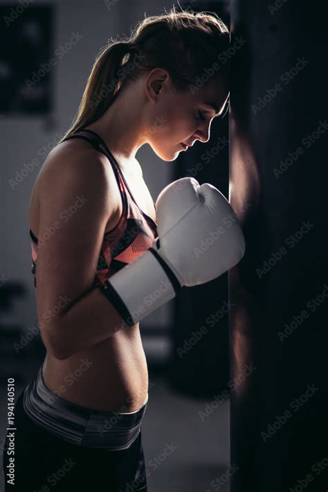 Sexy Fighter Girl In Gym With Boxing Bag Long Hair Woman Fitness Model