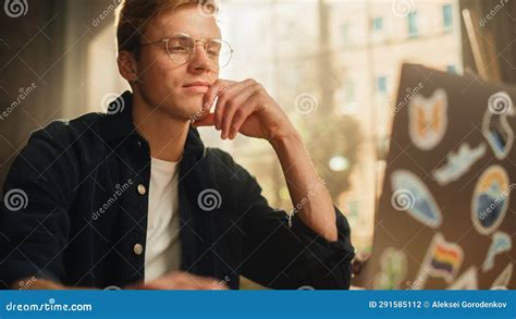 Focused Male Software Engineer Codding On Laptop Computer And Working With Inspiration In Modern