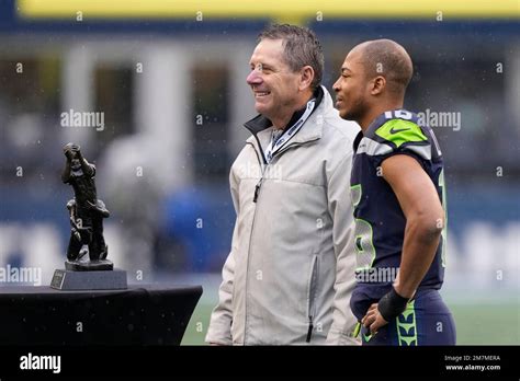 Nfl Hall Of Famer Steve Largent Presents The Steve Largent Award To Seattle Seahawks Wide