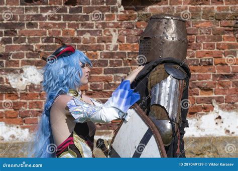 Knight Girl Communicates With Visitors At The Festival `knights Of