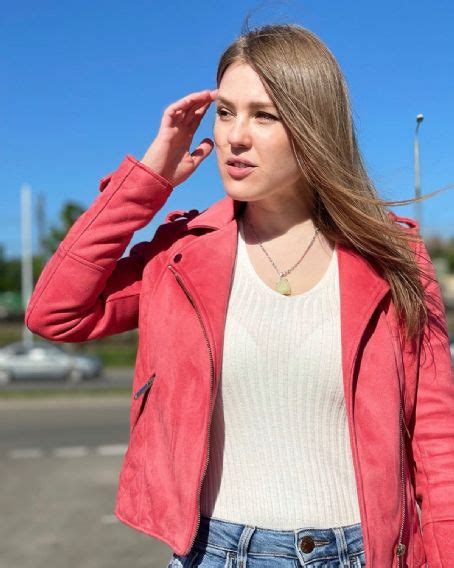 Viola Bailey Violeta Jurgis Arturovna Wears Pink Jacket And White