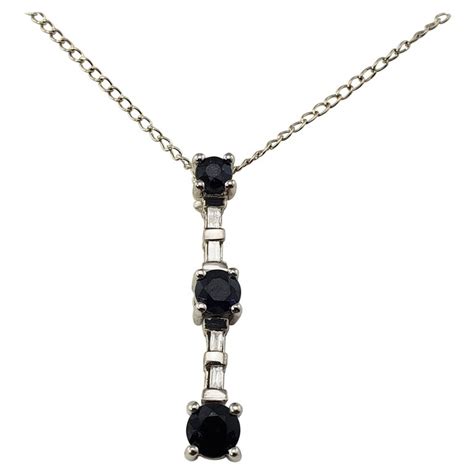 14 Karat White Gold Sapphire And Diamond Pendant Necklace For Sale At