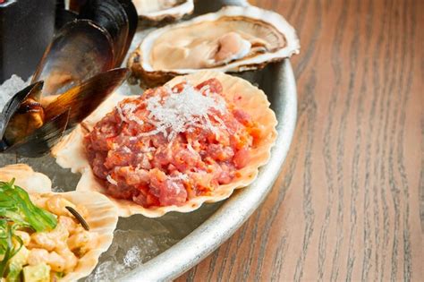 Premium Photo Fresh Seafood Stuffed Scallops Or Scallop Tartare In