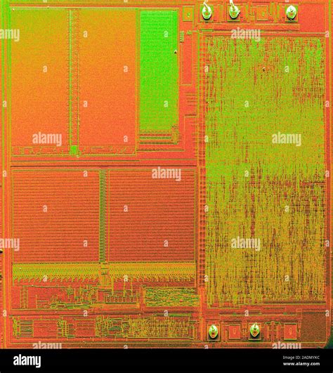Microchip Coloured Scanning Electron Micrograph Sem Of A Microchip From A Chip And Pin