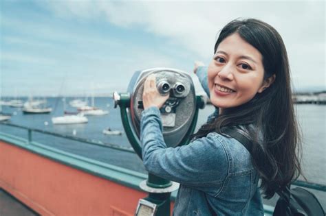 Premium Photo Young Girl Backpacker Tourist Sightseeing Binoculars