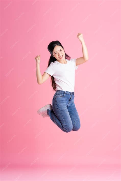 Full Body Image Of Asian Girl Posing On Pink Background Premium Photo