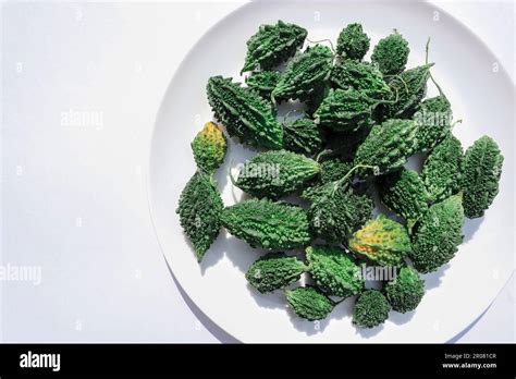 Small Size Bitter Gourds Or Bitter Melon On White Background Stock