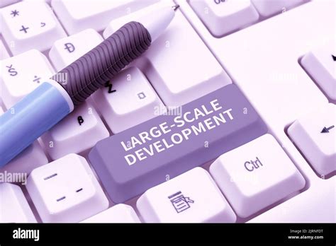 Hand Writing Sign Large Scale Development Business Showcase Develop On An Extensive Basis Grow