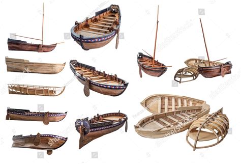Model Of A Small Warship Of The 18th Century Made Of Wood On A White Background At Different