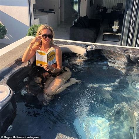 Megan Mckenna Looks Relaxed As She Enjoys The April Sunshine By Reading A Motivational Book