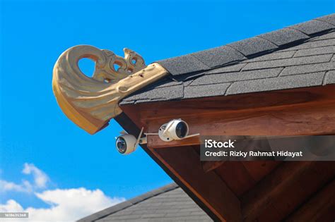 Cctv Camera On A Roof To Maintain Security In A Restaurant Cloudy Sky