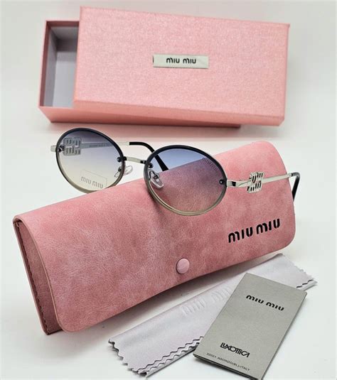 Miu Miu Очки солнцезащитные купить на Ozon по низкой цене 1608955066