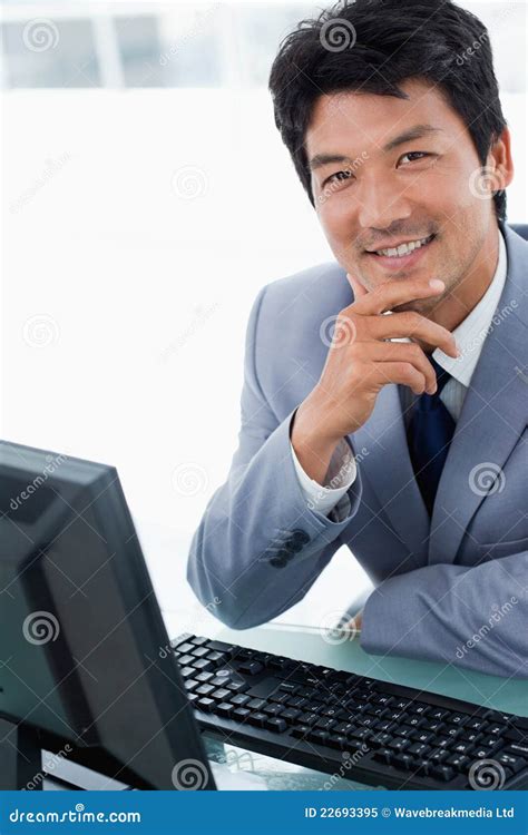 portrait of a happy manager using a computer stock image image of network expert 22693395