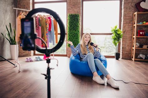 Photo Of Cheerful Cute Girl Blogger Telling Story Recording Video