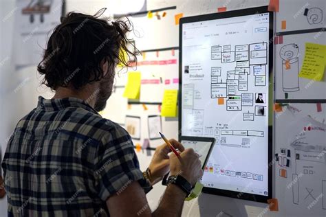 Premium Photo Uxui Designer Prototyping A Mobile Application