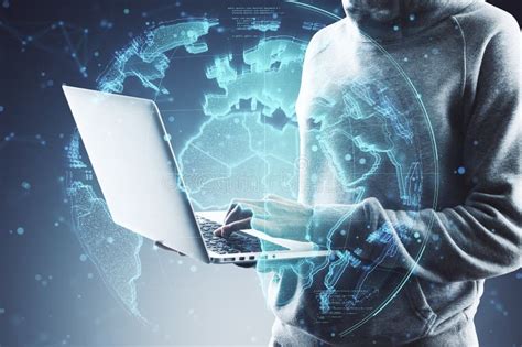 hacker using laptop with glowing polygonal globe hologram stock image