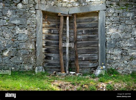 A Broken Stone Lintel With Evidence Of Repeated Attempts To Shore It Up