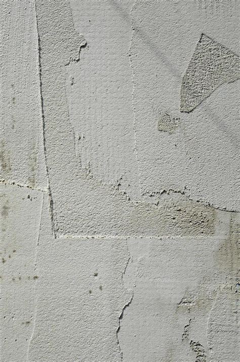 The Texture Of The Wall Covered With Gray Foam Polystyrene Plates Which Are Smeared With A