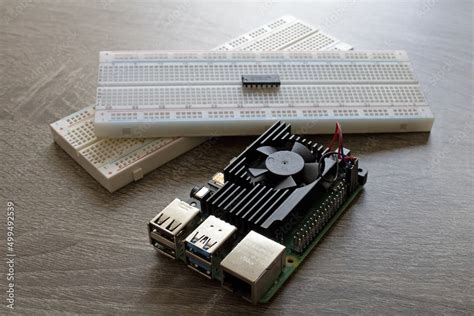 Raspberry Pi Microcomputer With Breadboard And Micro Chip Processor For Electrical Engineering