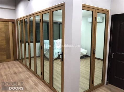 แบบประตูรุ่นรางแขวน ศูนย์รวมประตูบานเฟี้ยม ภายใน ภายนอกบ้าน ตัวอย่างกว่า50ผลงาน